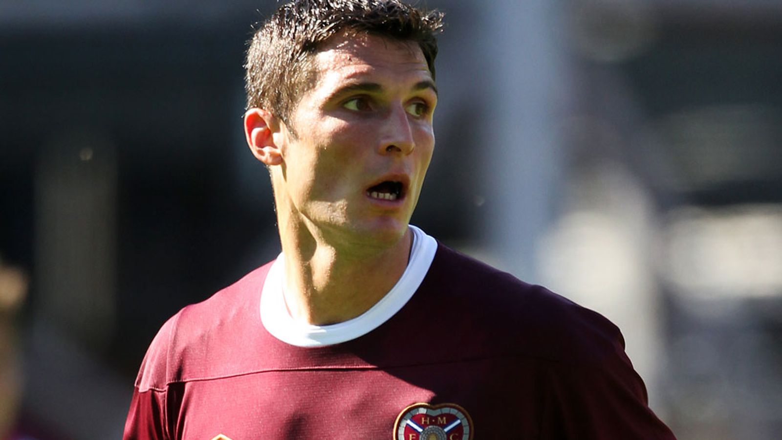 Late John Sutton goal floors brave Dundee as Hearts claim much-needed ...