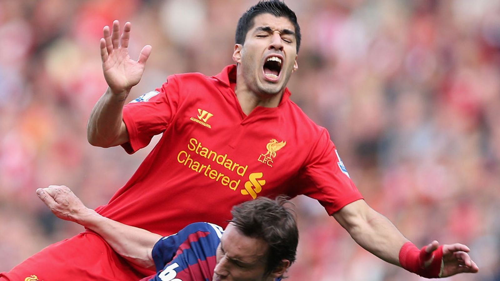 Liverpool's Luis Suarez hits back at FIFA 'cheat' blast | Football News ...