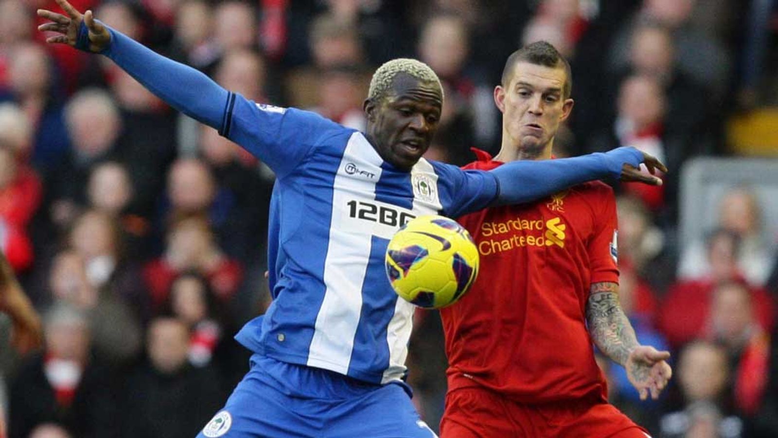 Wigan striker Arouna Kone admits he would like to play Champions League ...