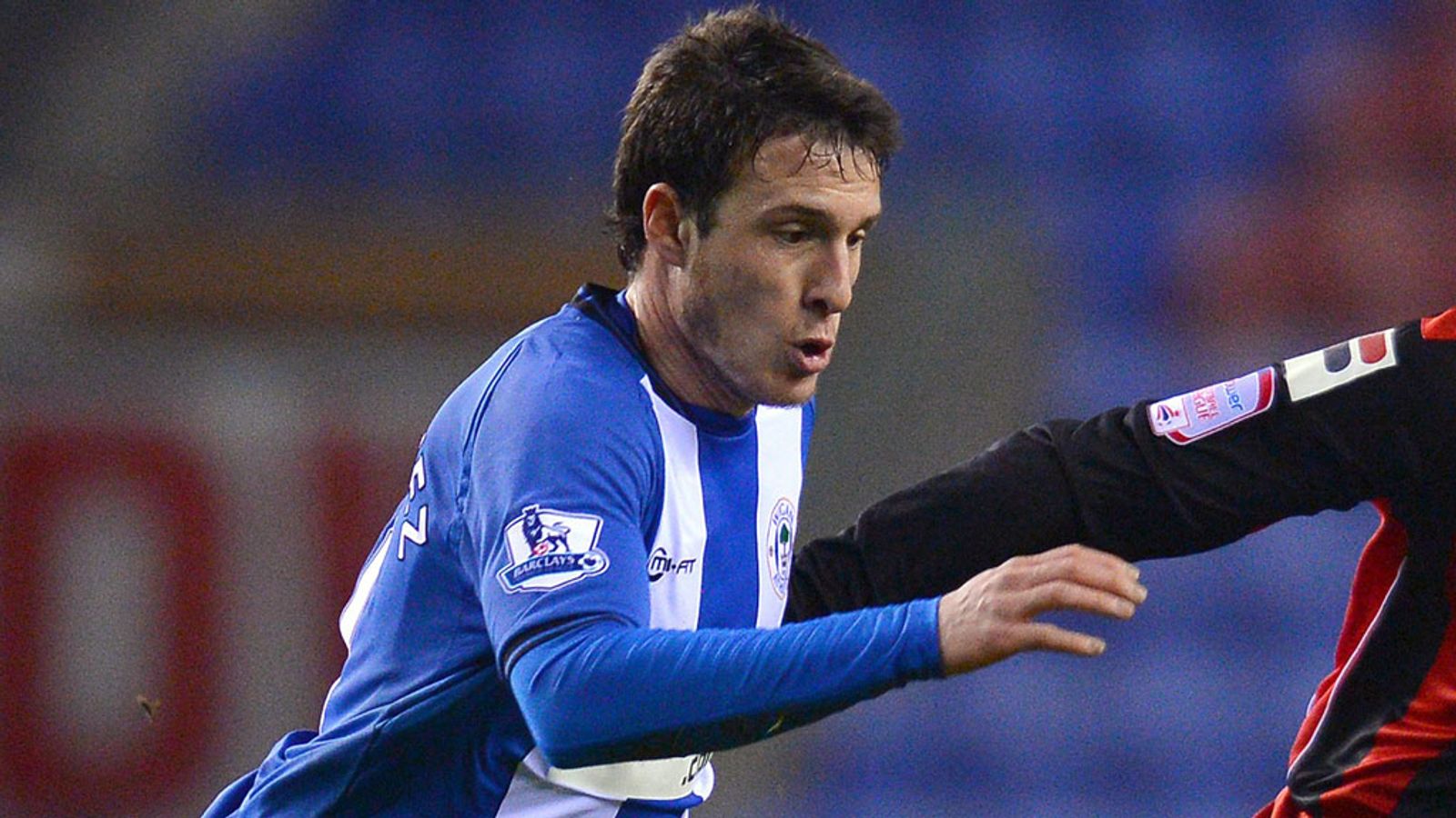 Roberto Martinez hails Wigan's young loan signing Angelo Henriquez ...
