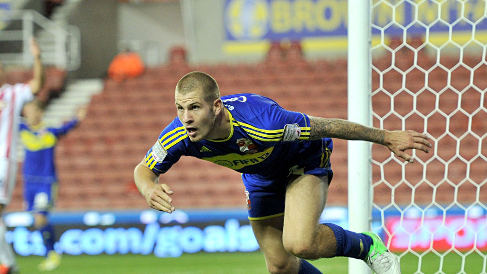 Swindon striker James Collins admits it was a surreal experience to ...