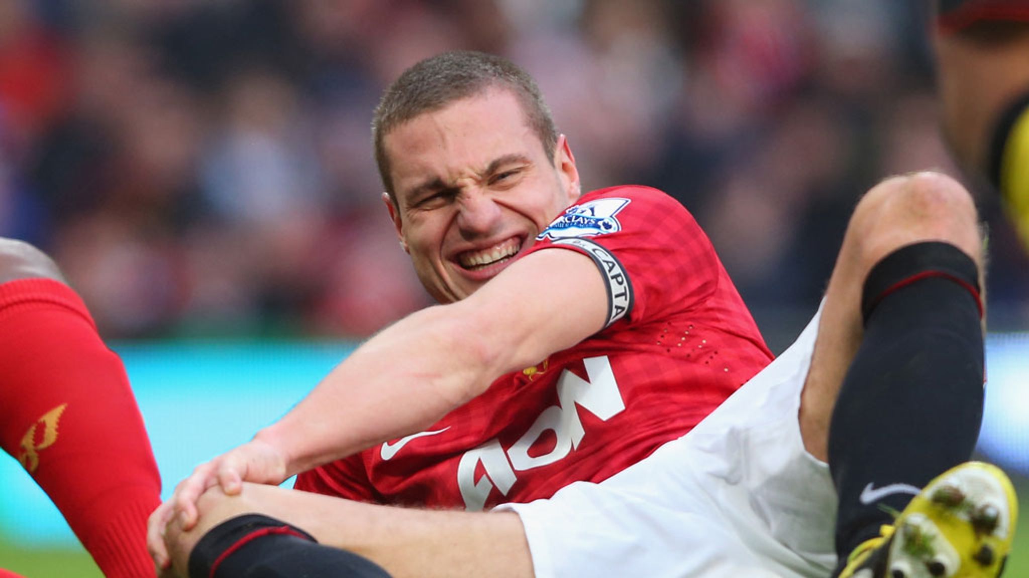 Manchester United boss Sir Alex Ferguson plays down injuries to Ashley ...