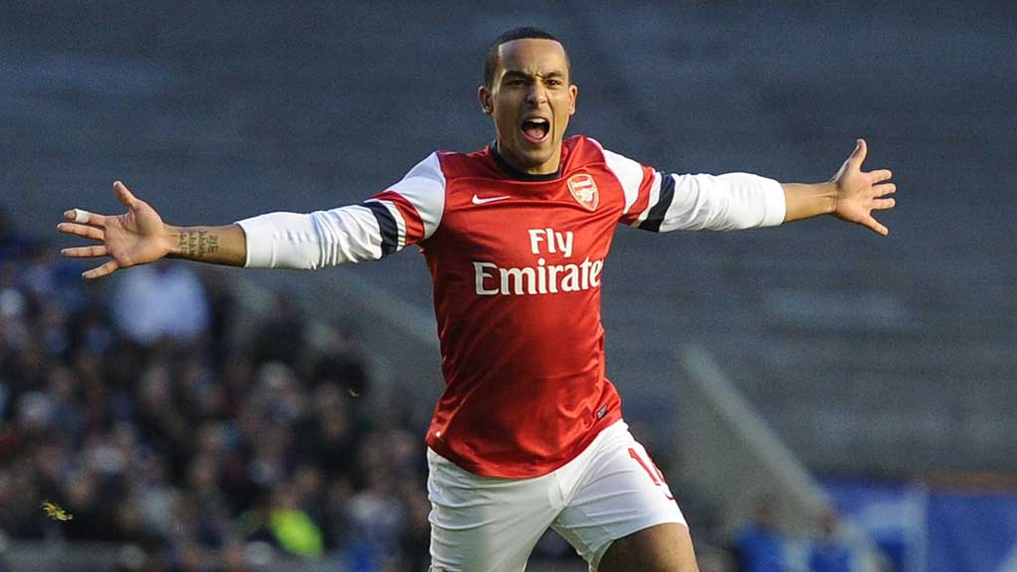 Theo Walcott would welcome the opportunity to play up front for England ...