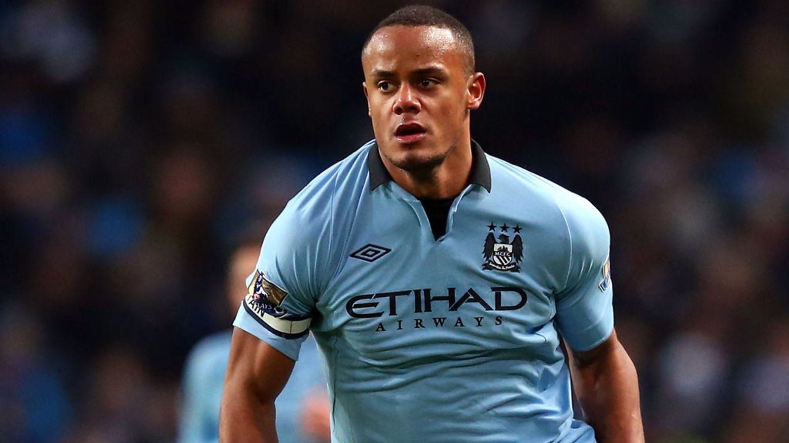 Manchester City captain Vincent Kompany could miss another three weeks ...