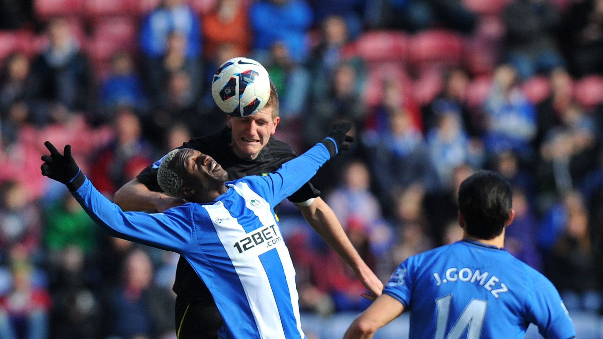 Wigan's Emmerson Boyce salutes the efforts of in-form Arouna Kone ...