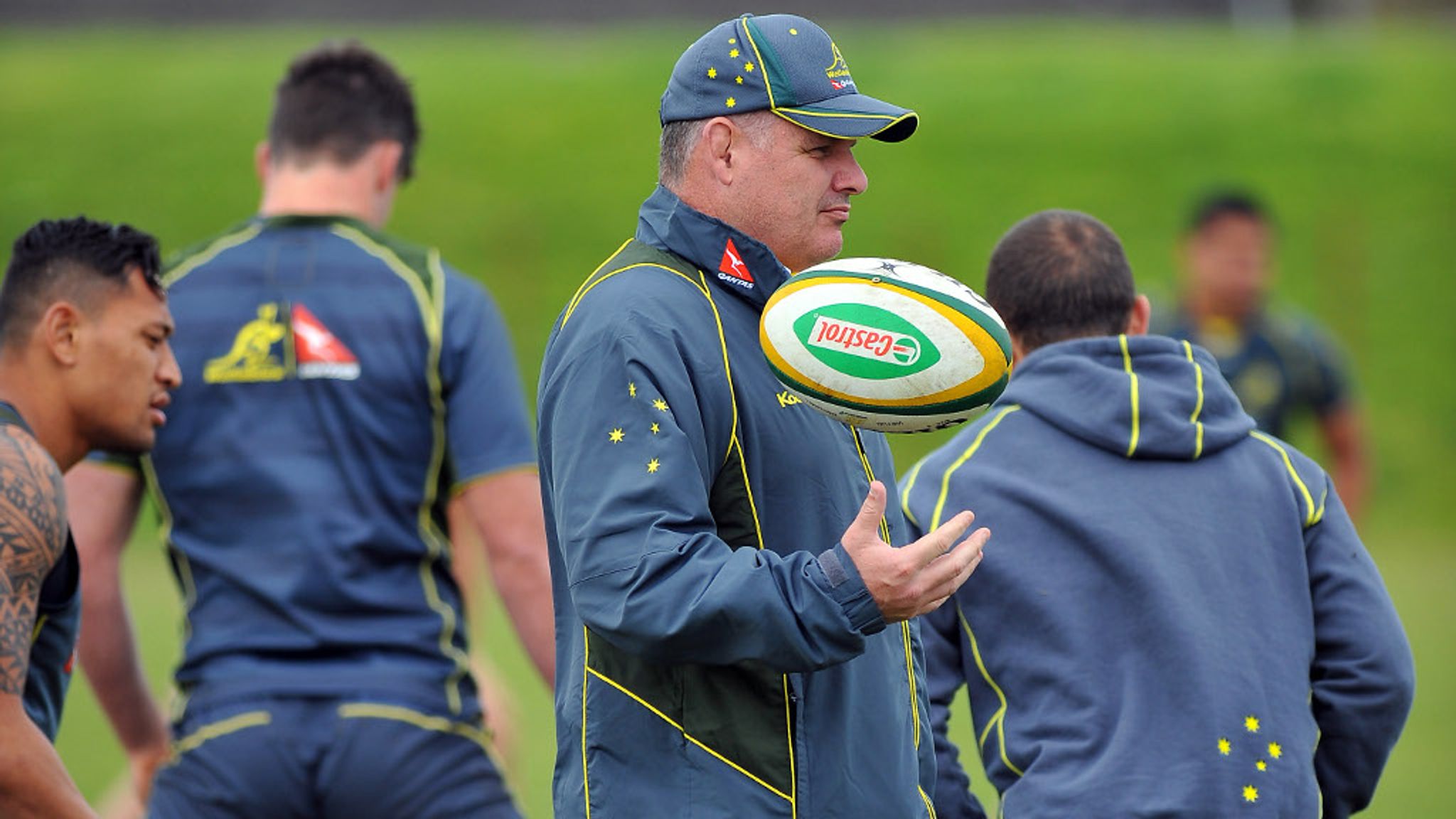 New coach Ewen McKenzie impressed with new backline for Australia ...