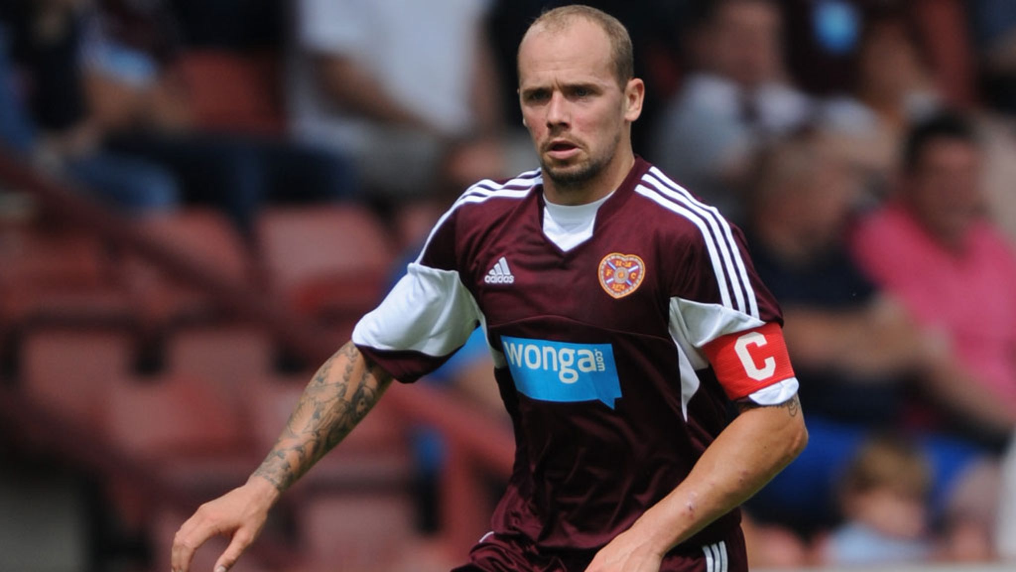 Scottish football: Hearts hit back to claim 2-1 win over 10-man St ...