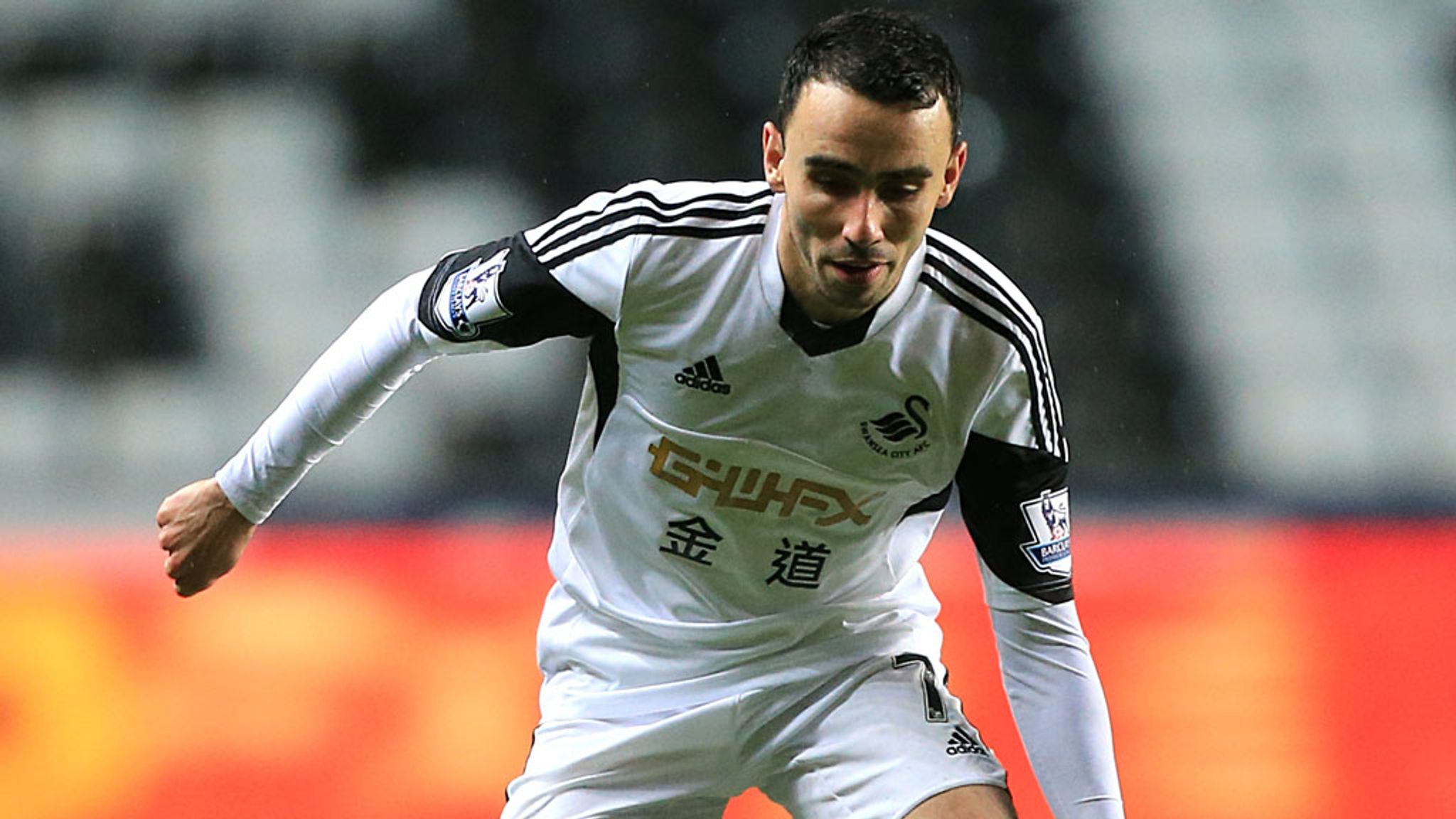 Transfer news: Swansea midfielder Leon Britton signs new contract ...