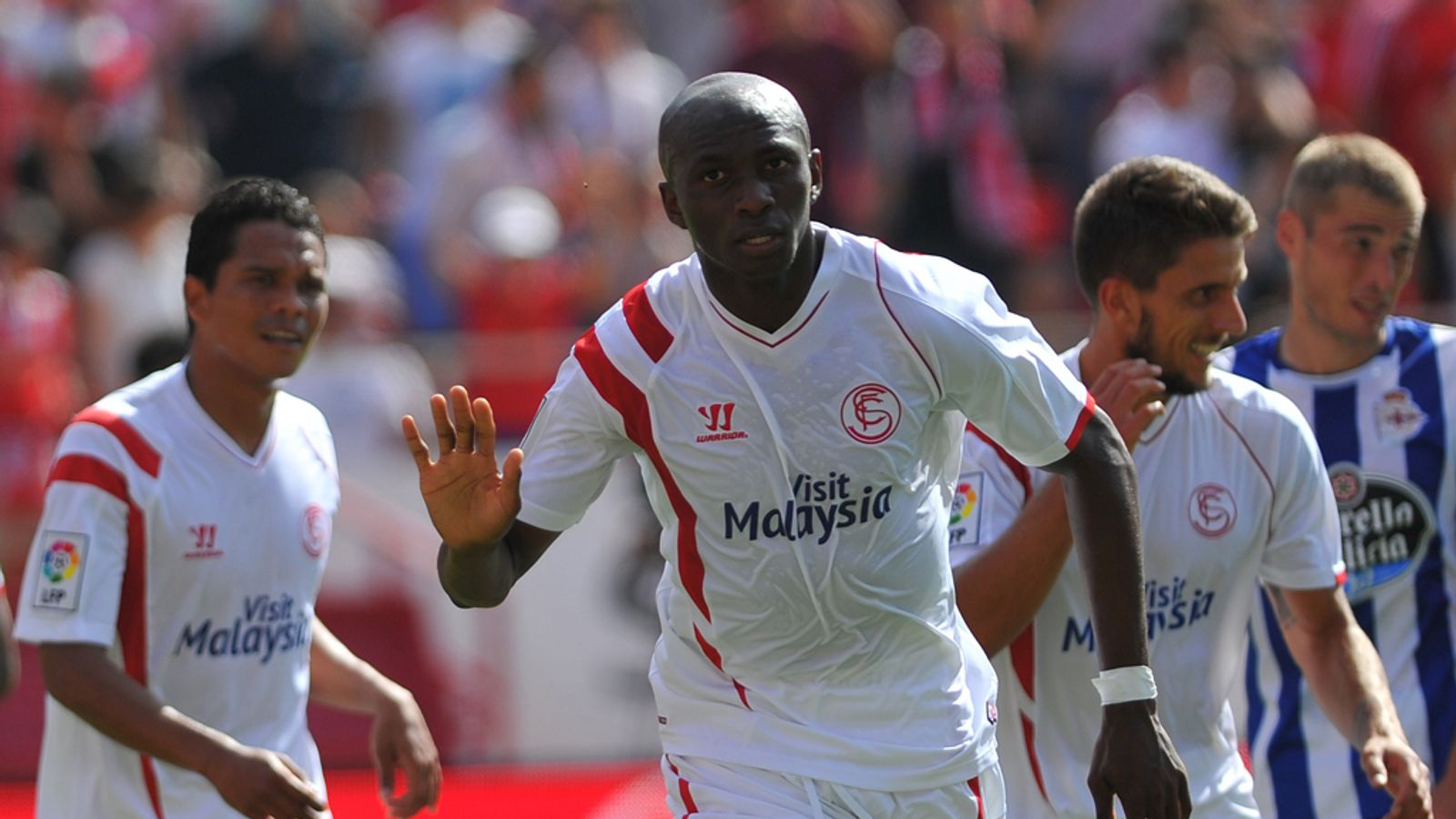 Primera Division: Stephane Mbia scores twice as Sevilla beat Deportivo ...