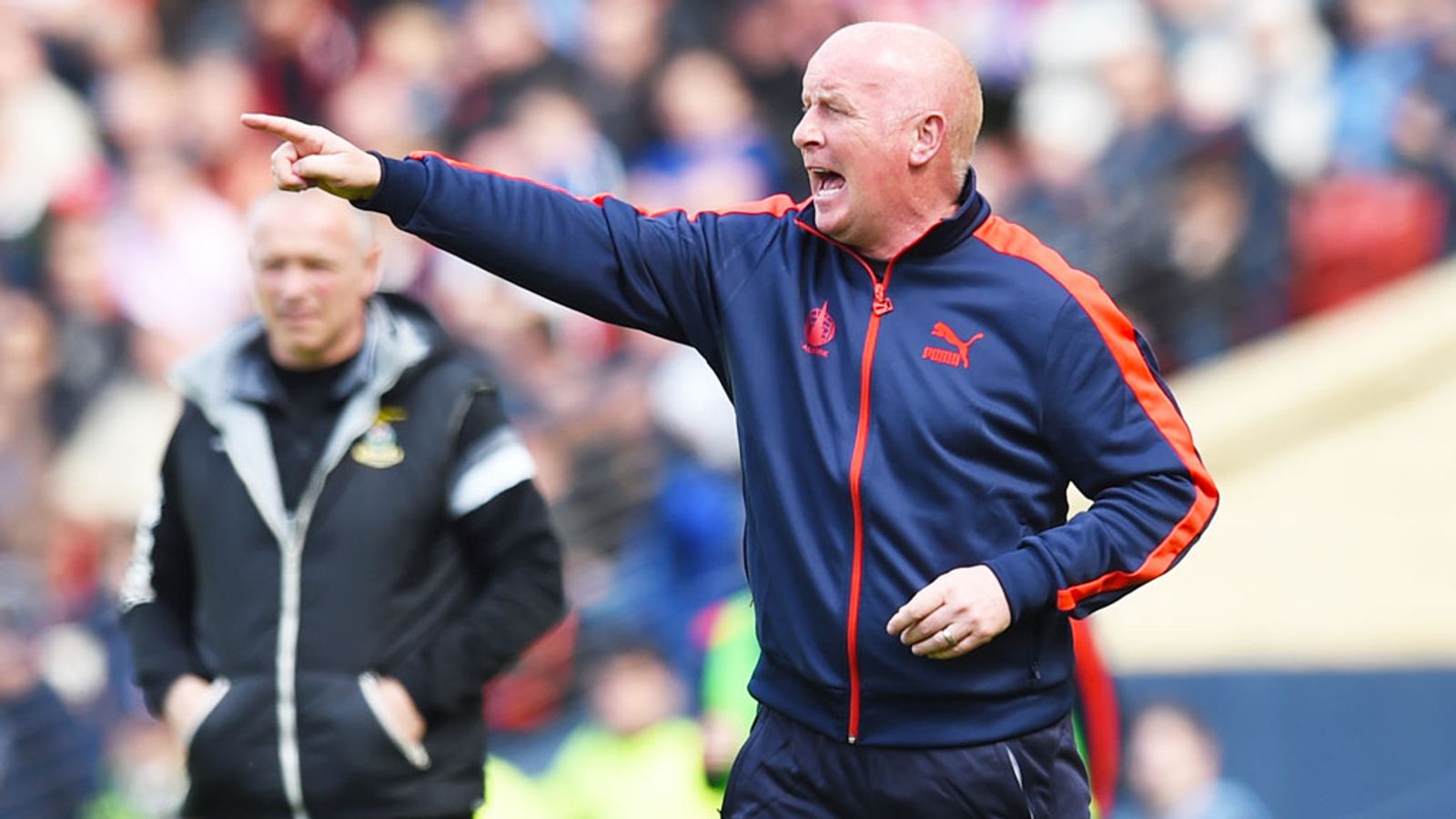 Falkirk boss Peter Houston has to console his players after the ...