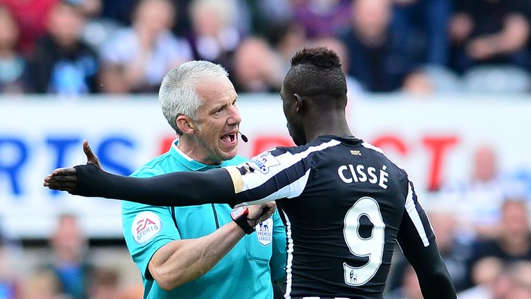 Newcastle striker Papiss Cisse vows to behave after returning from ...