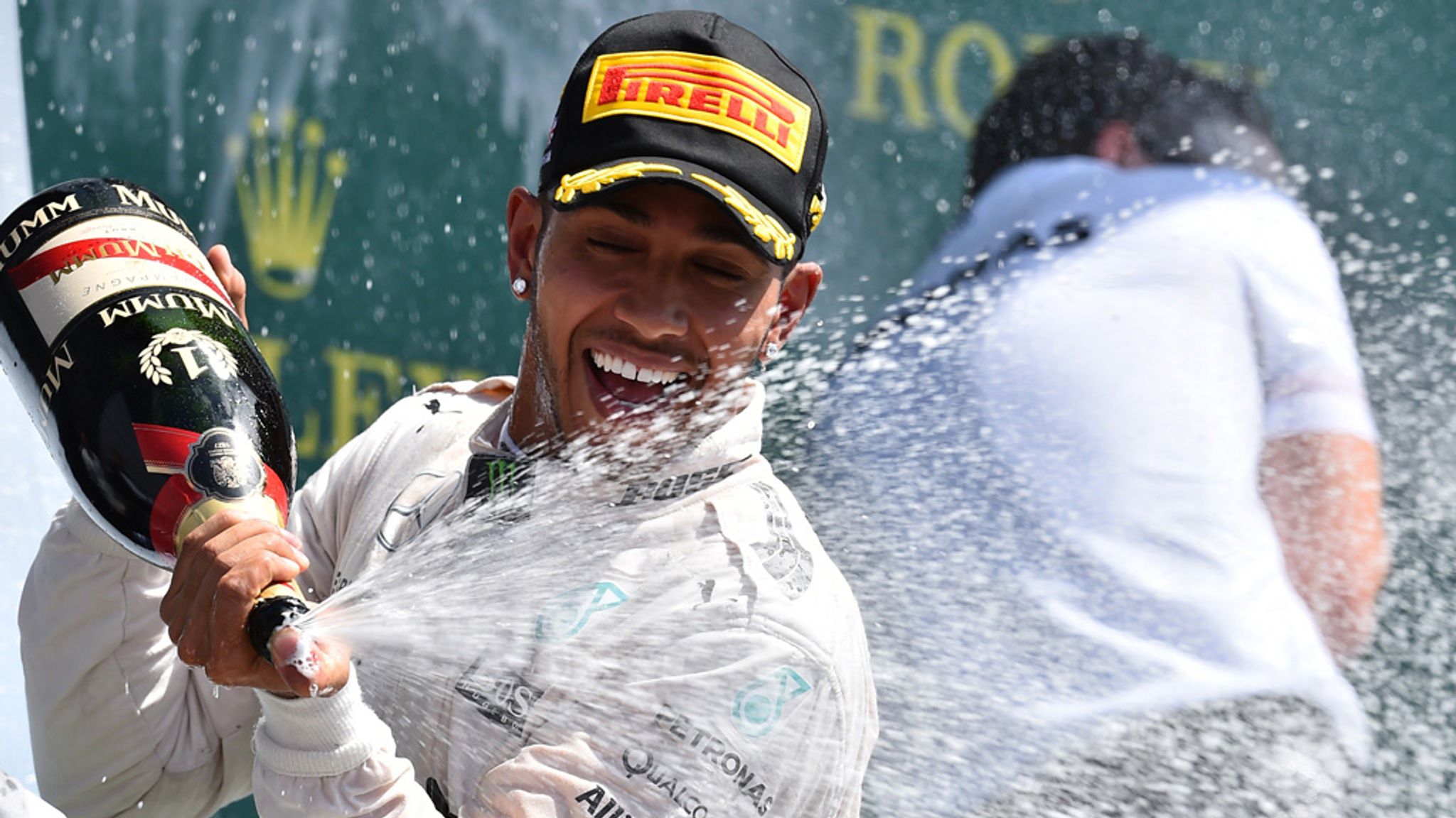 Lewis Hamilton beats Nico Rosberg and the rain to win the British GP ...