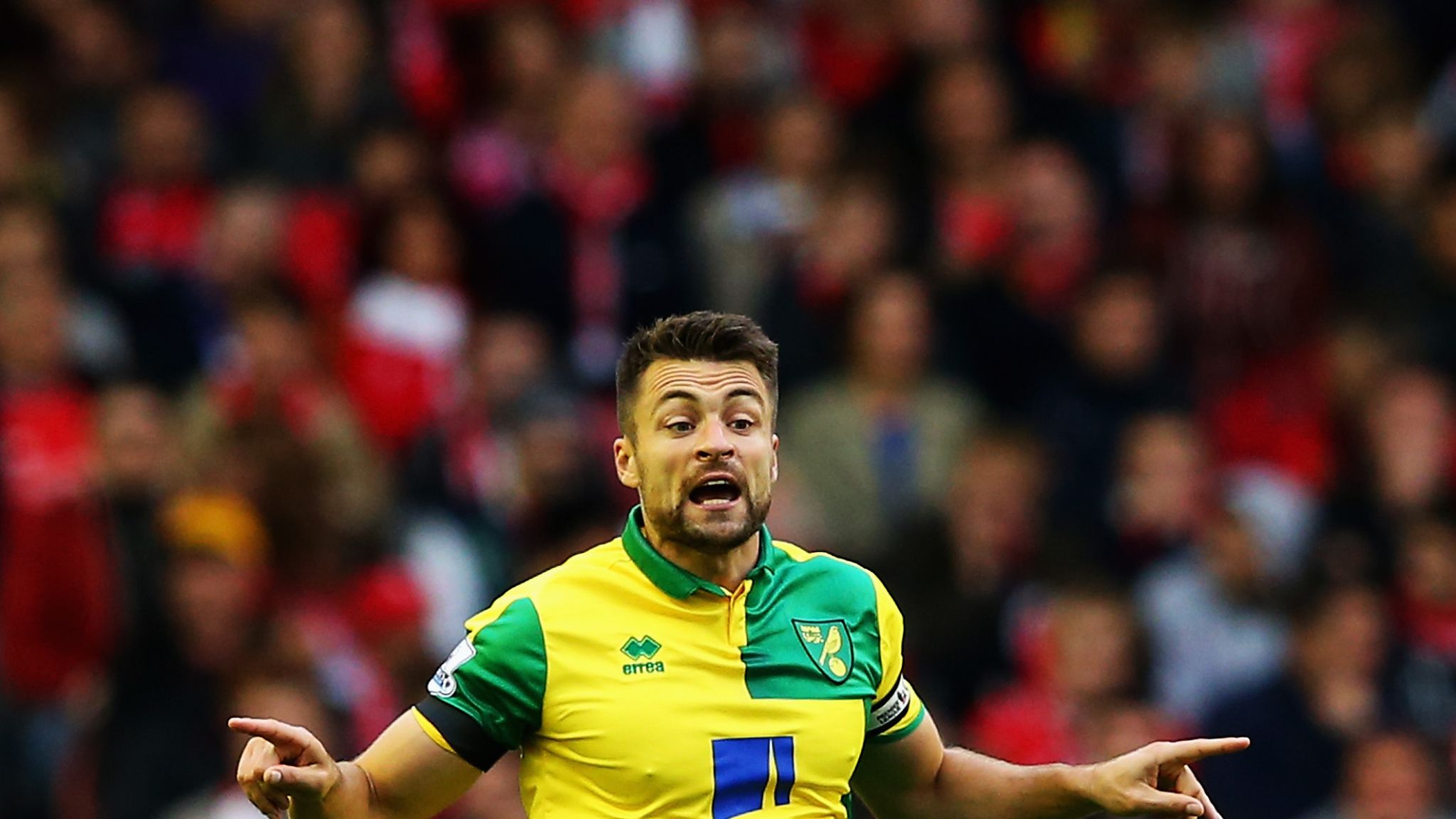 Anfield goal caps off memorable day for Norwich captain Russell Martin ...