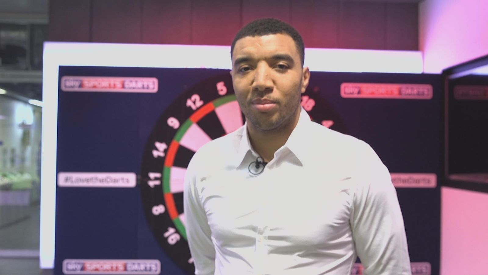 Troy Deeney shows off his shooting accuracy in the Darts Ball Challenge ...