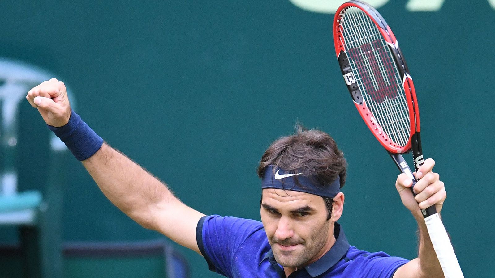 Roger Federer and Dominic Thiem in action at Gerry Weber Open in Halle ...