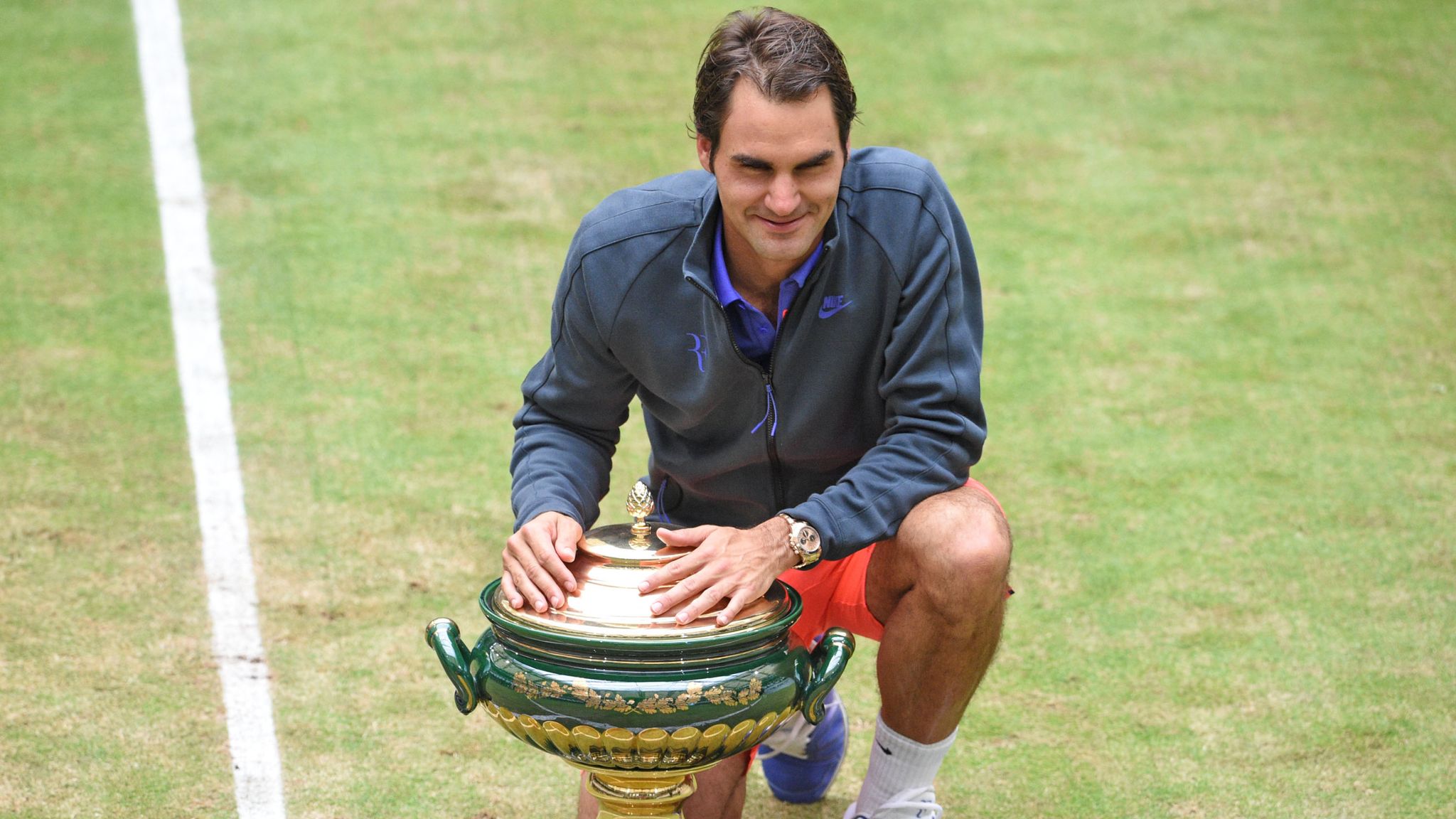 Roger Federer, Dominic Thiem and Kei NIshikori in action at Gerry Weber ...