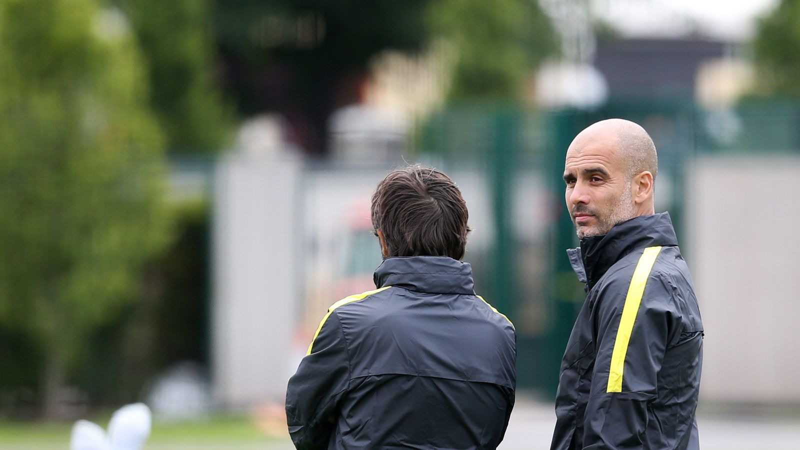 Manchester City boss Pep Guardiola takes first training session ...