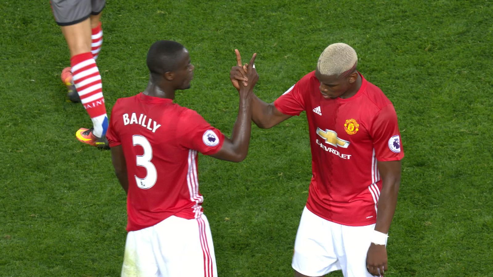 Paul Pogba shows off handshakes with Eric Bailly and Antonio Valencia ...