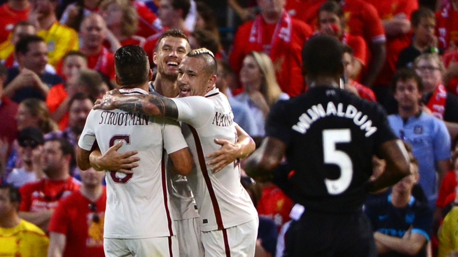 Liverpool 1-2 Roma highlights: Edin Dzeko and Mohamed Salah see off ...
