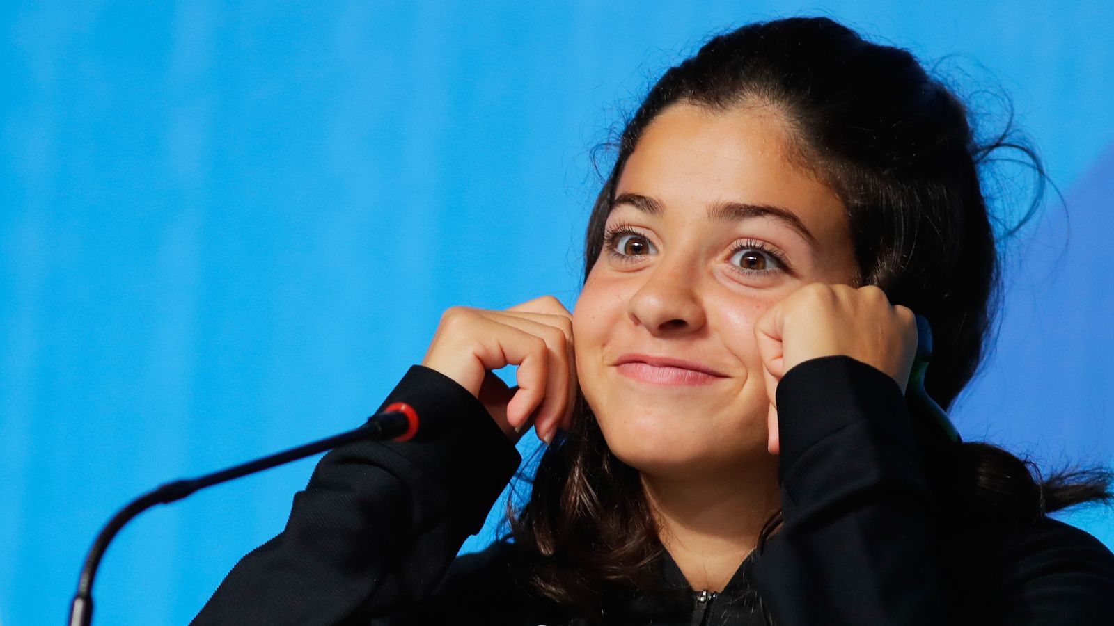 Syrian refugee Yusra Mardini wins swimming heat at Rio Olympics ...