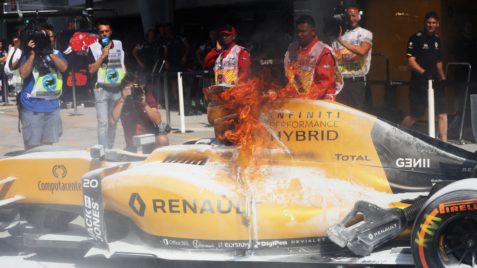 Kevin Magnussen's Renault catches fire in the pitlane in Malaysia GP P1 ...