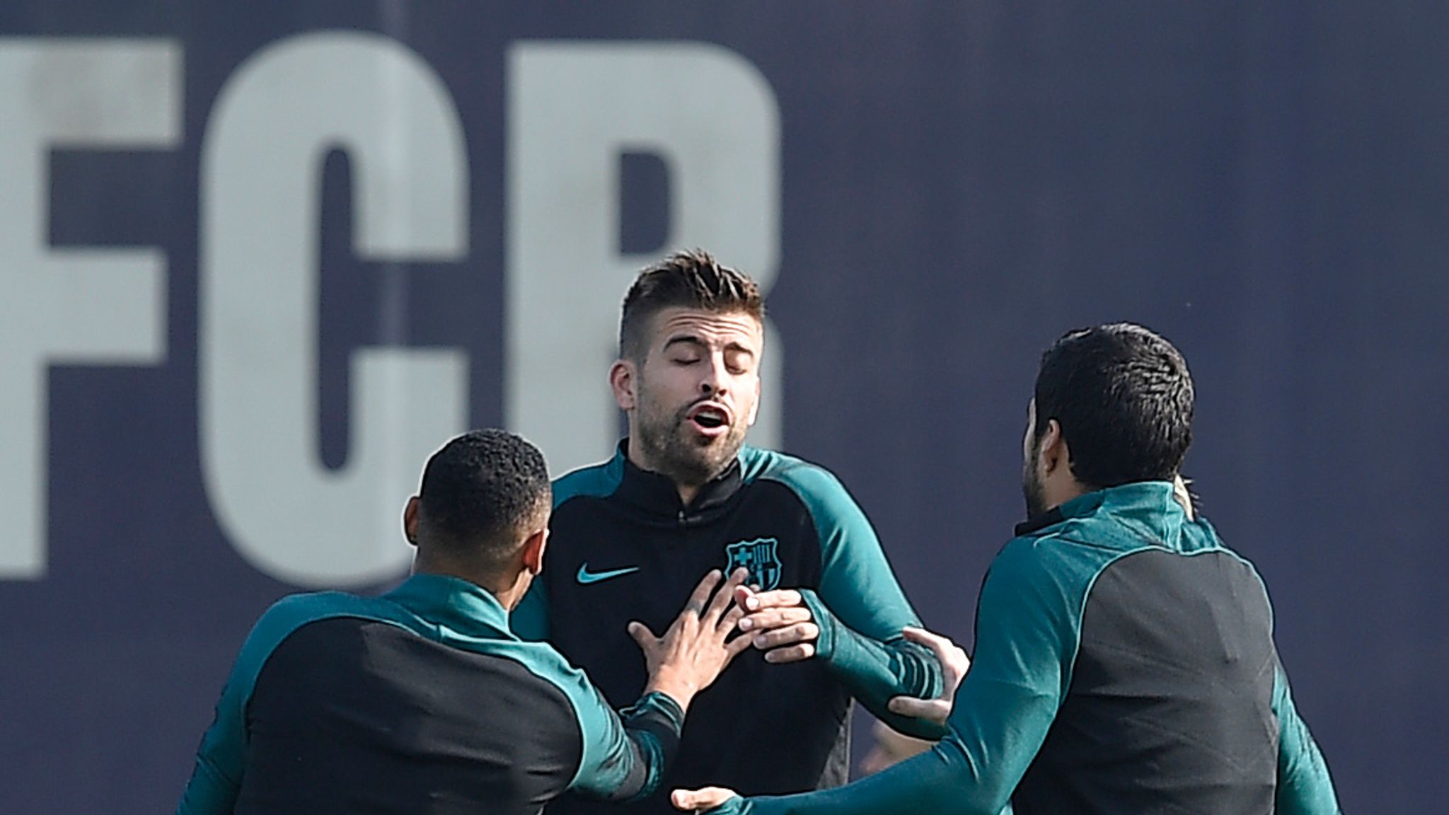 Gerard Pique and Luis Suarez square up in Barcelona training ahead of ...