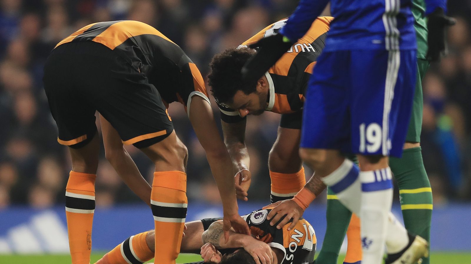 Arsenal’s Petr Cech offers support to Ryan Mason following skull ...