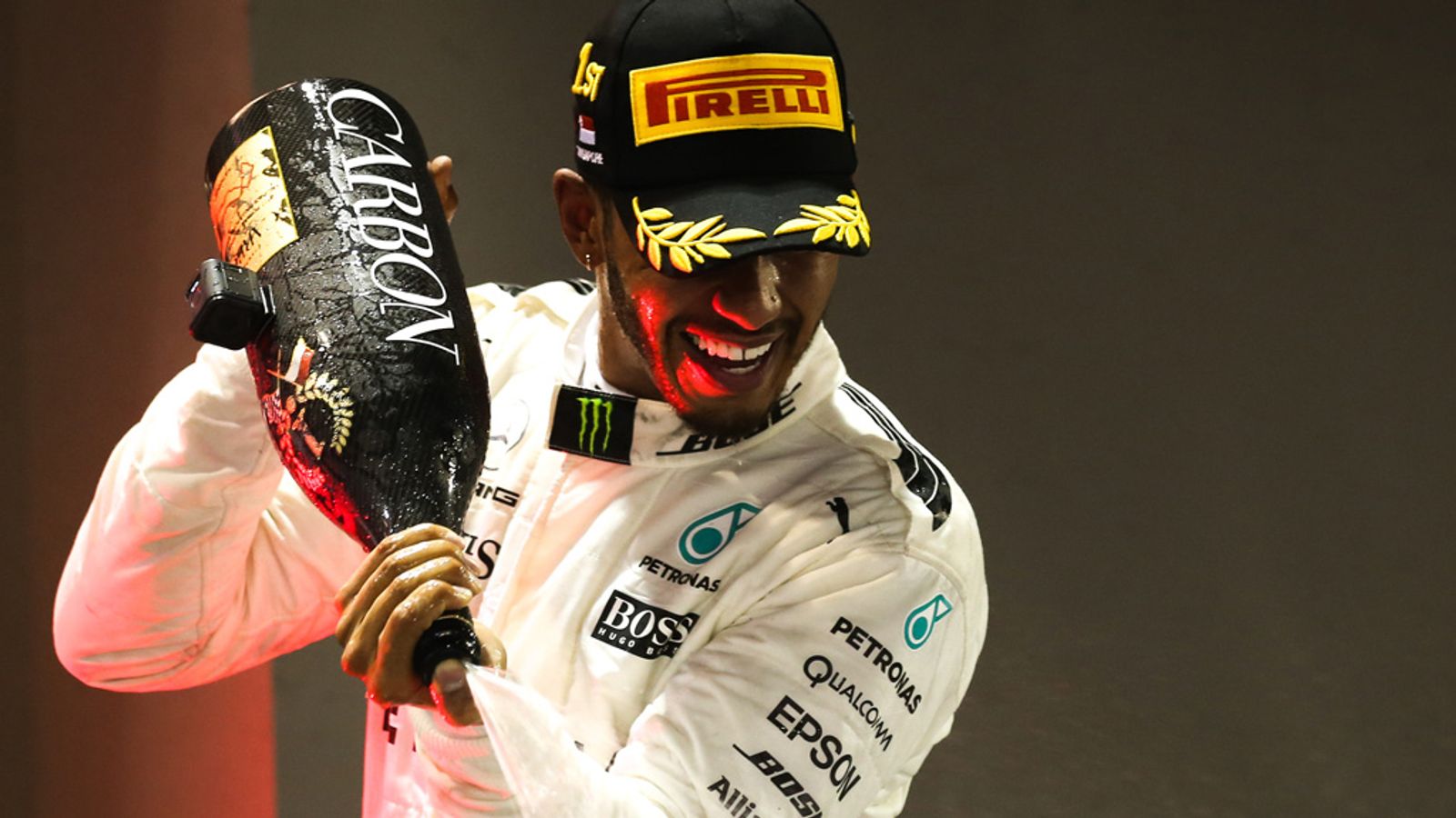 Lewis Hamilton enjoys 'dancing in the rain' as Sebastian Vettel falters ...