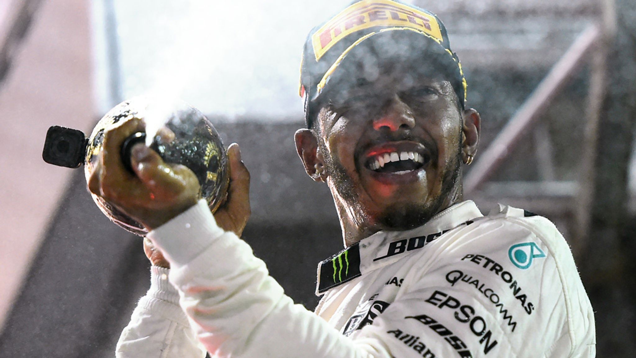 Lewis Hamilton enjoys 'dancing in the rain' as Sebastian Vettel falters ...