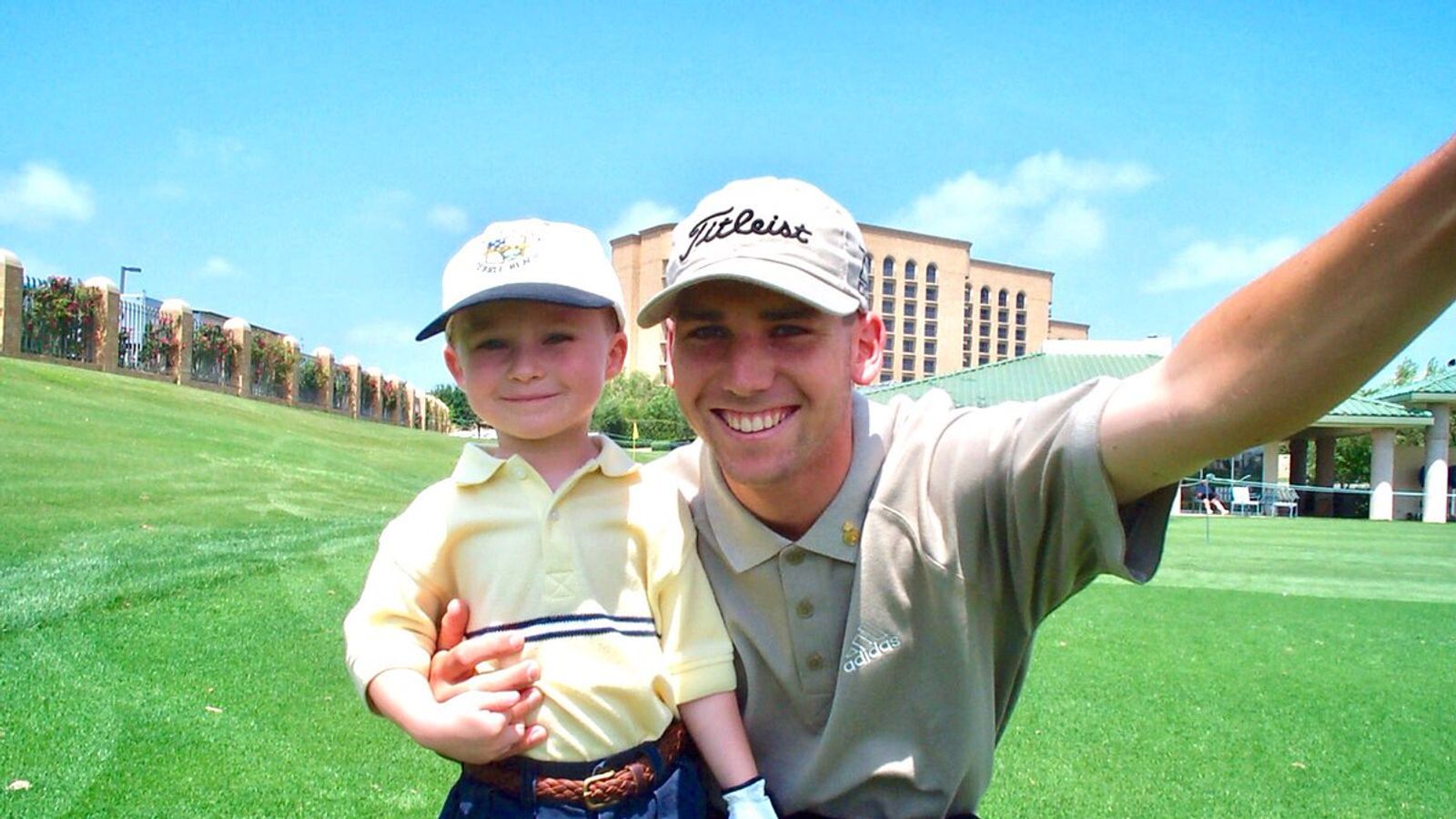 A two-year-old Austin Connelly pictured with Sergio Garcia in 1999 ...