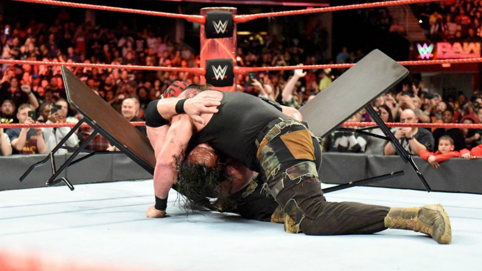 Strowman sends Kane through a table! | Sky Sports