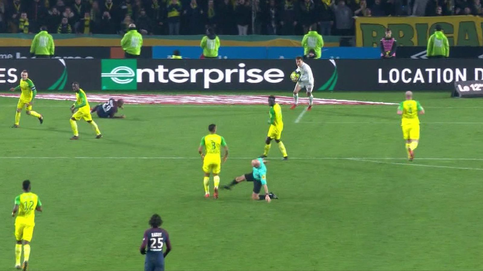 Referee Tony Chapron kicks out at Nantes' Diego Carlos before sending ...