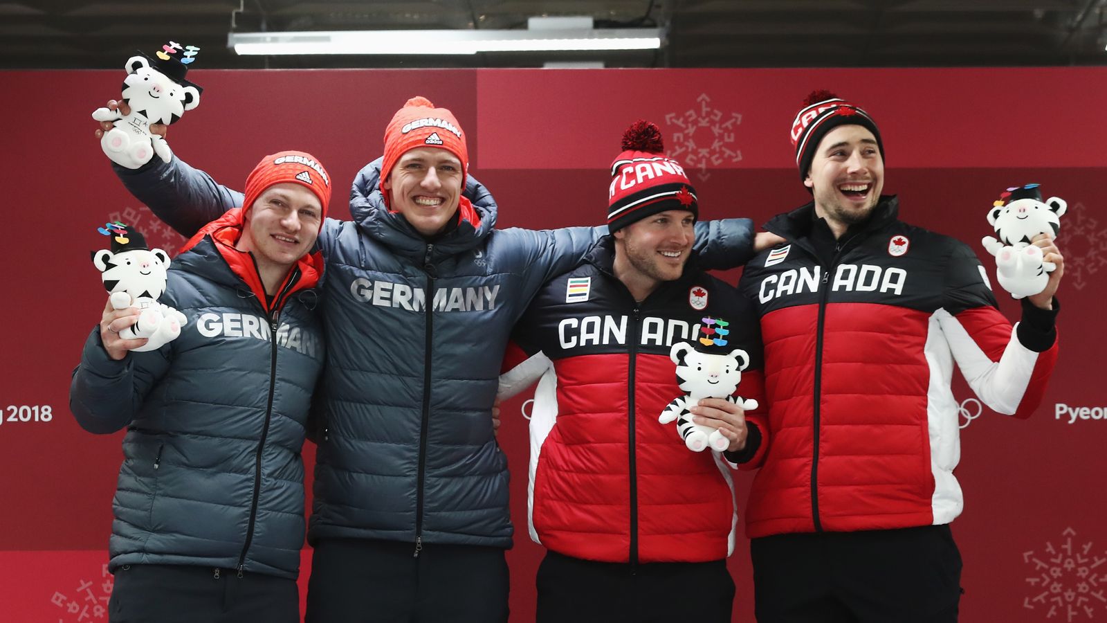 Canada and Germany share gold in historic Winter Olympics bobsleigh ...