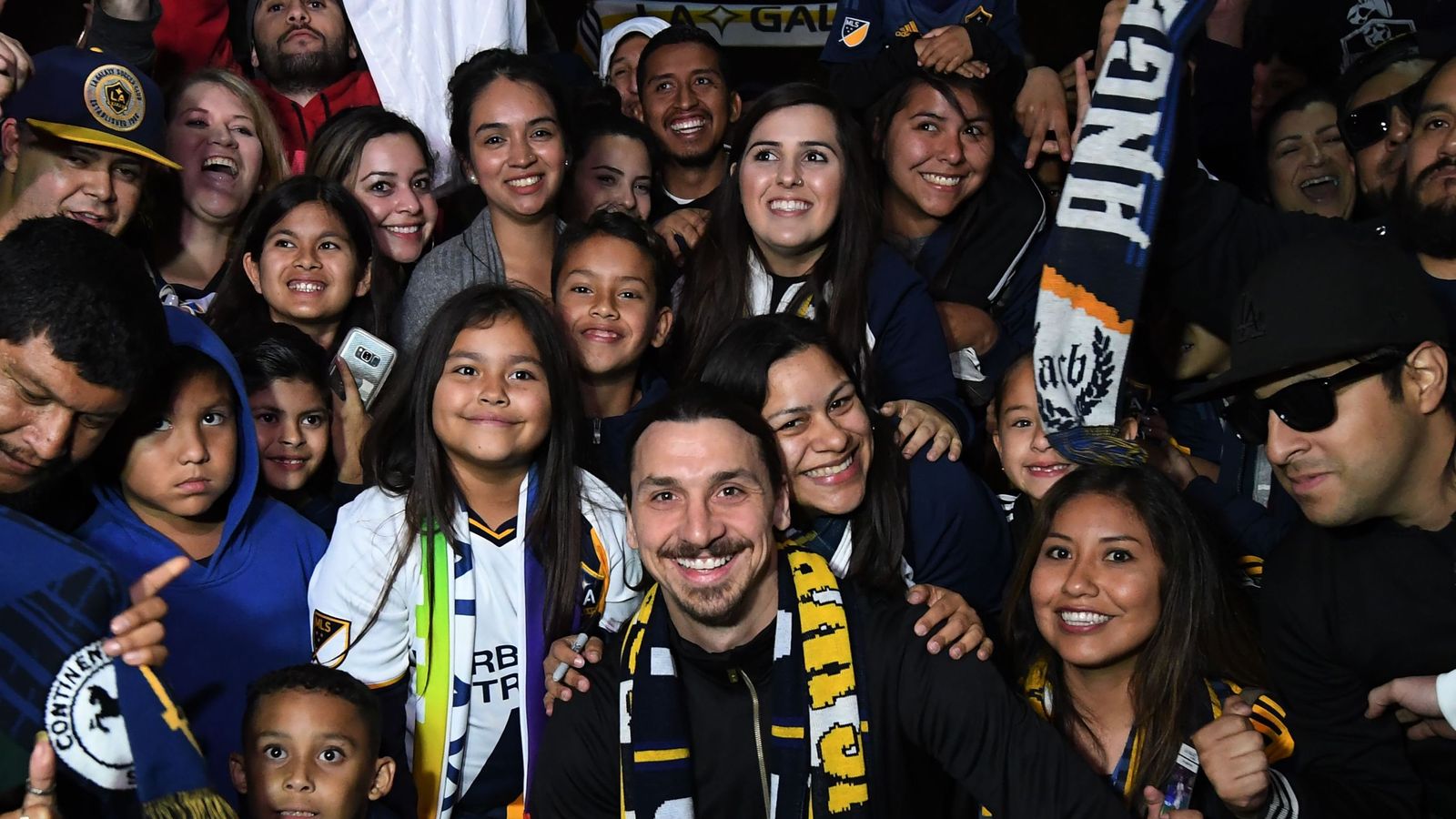Zlatan Ibrahimovic met by fans on arrival at LA International Airport ...