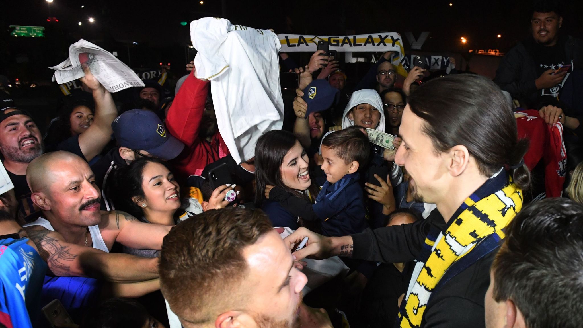 Zlatan Ibrahimovic met by fans on arrival at LA International Airport ...