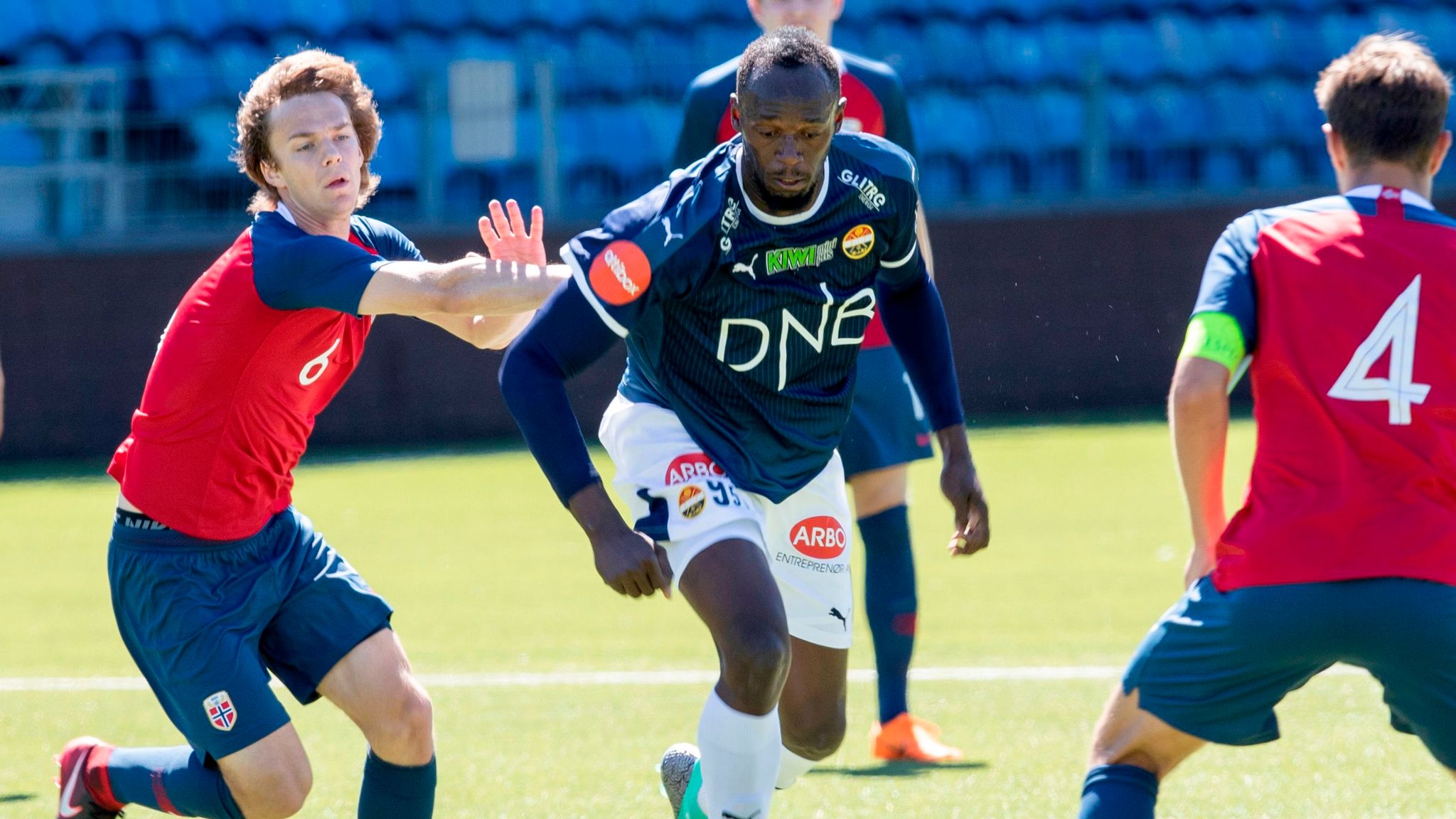 Usain Bolt plays for Norwegian team Stromsgodset in friendly vs Norway ...
