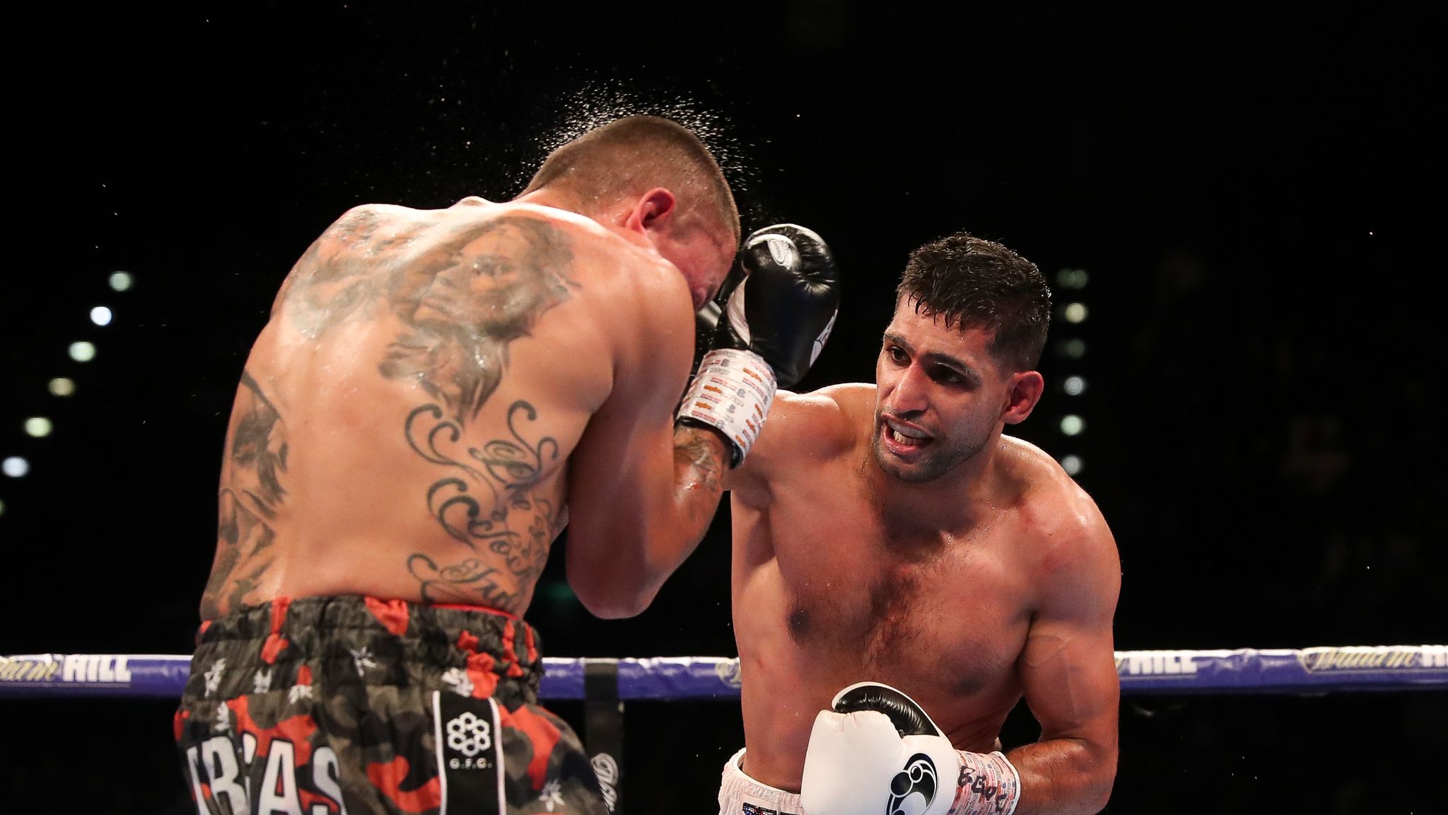 Khan vs Vargas: Amir Khan climbs off canvas to beat Samuel Vargas ...