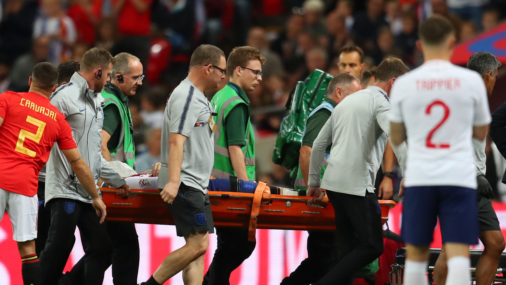 Manchester United's Luke Shaw stretchered off on England return with ...