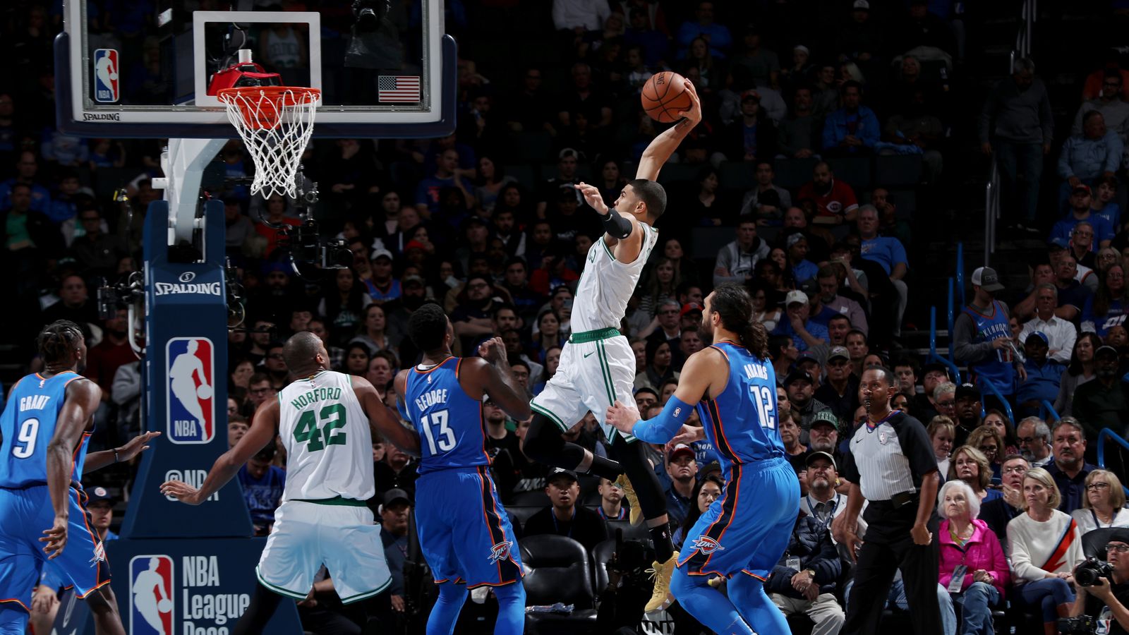 Jayson Tatum throws down a powerful fast-break dunk as Boston Celtics ...
