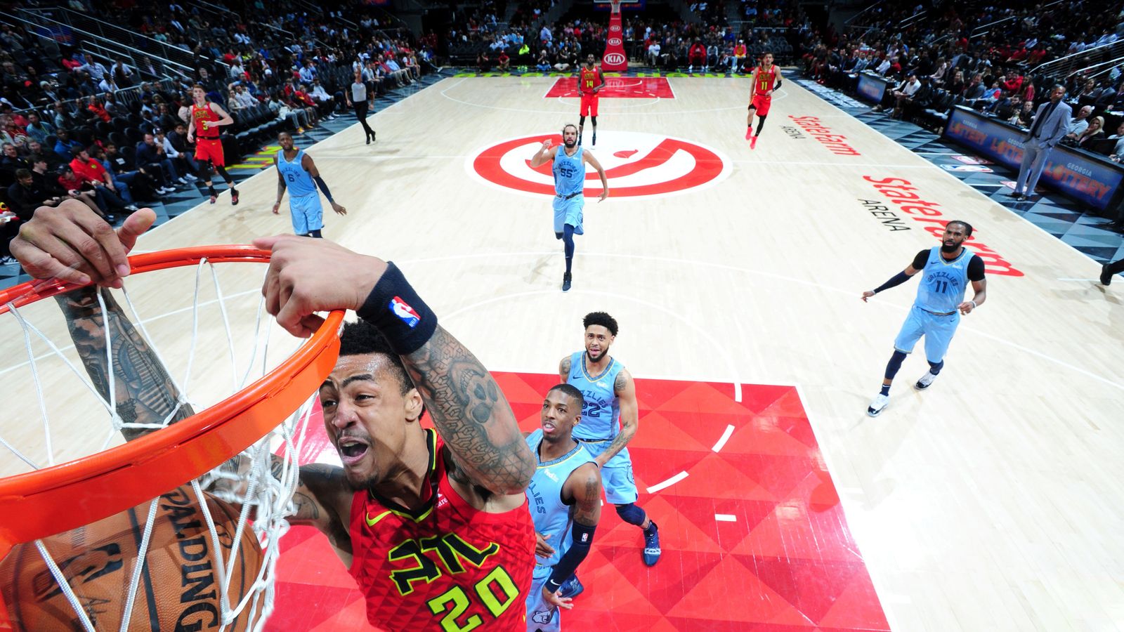 Trae Young and John Collins connect on fullcourt alley-oop as Atlanta ...