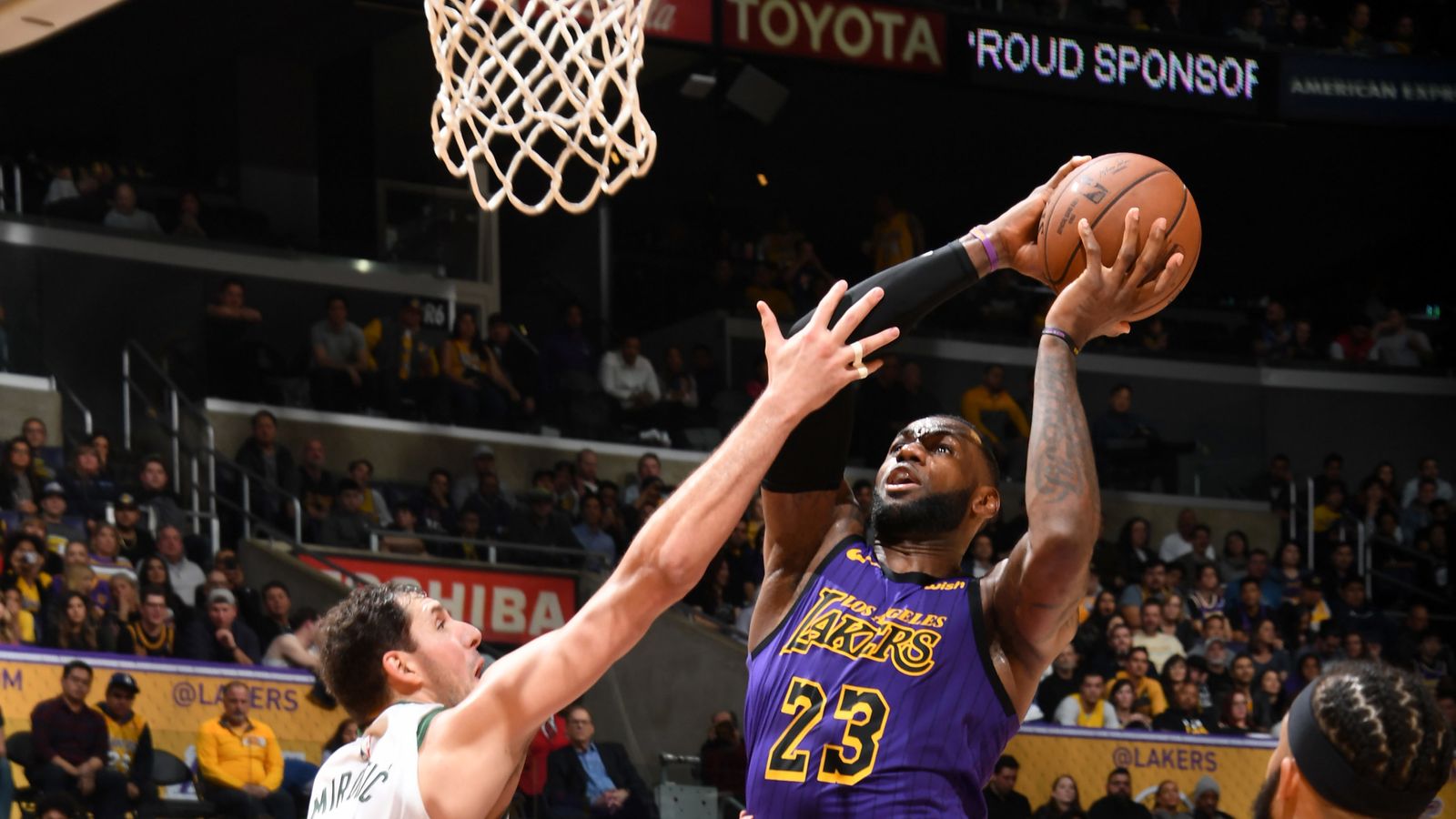 LeBron James slams home emphatic reverse put-back dunk in Los Angeles ...