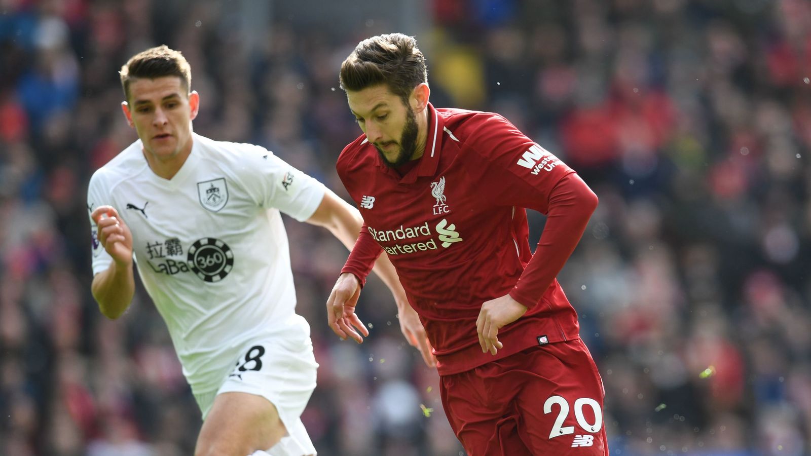 Liverpool midfielder Adam Lallana insists he is not leaving the club ...