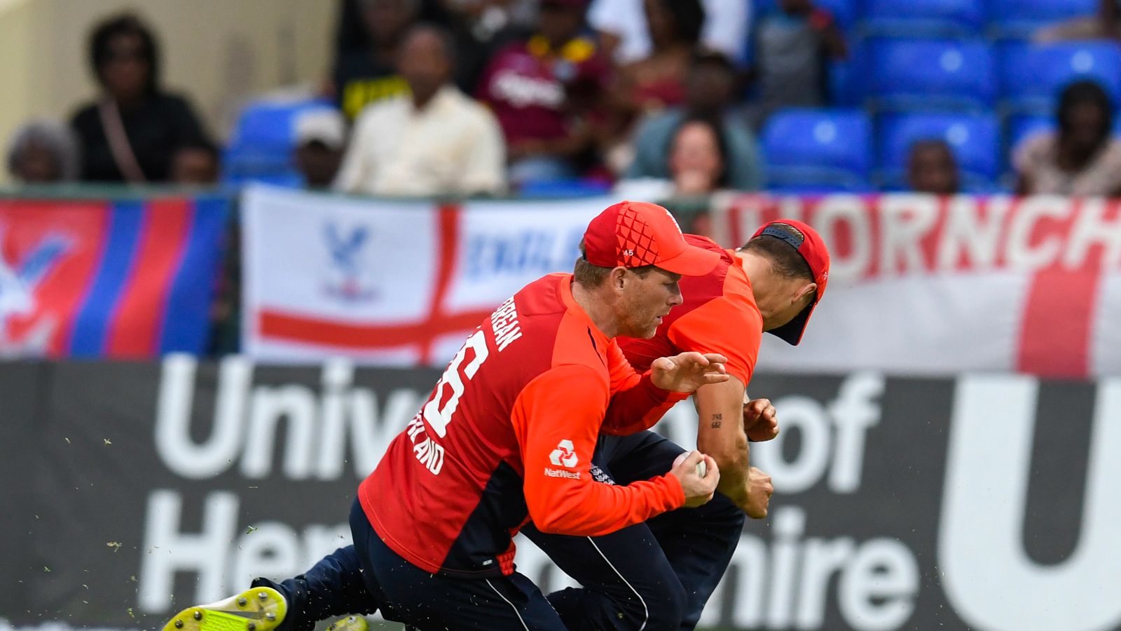 WATCH: England's Eoin Morgan takes catch despite collision with Tom ...