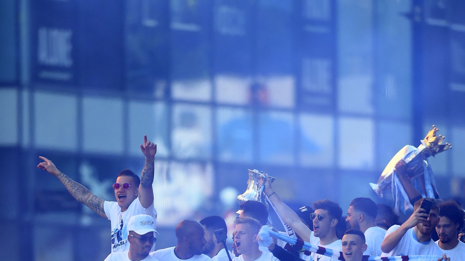 Manchester underwent a blue rinse as City celebrated their domestic ...