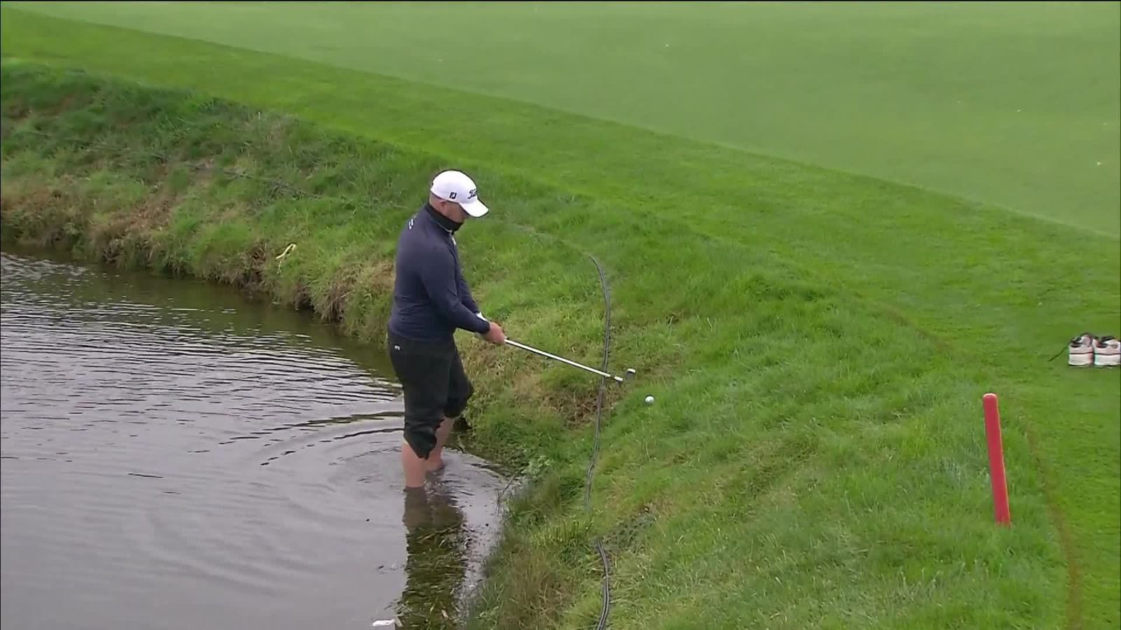 George Coetzee plays from water bare-footed at Open de France | Golf ...