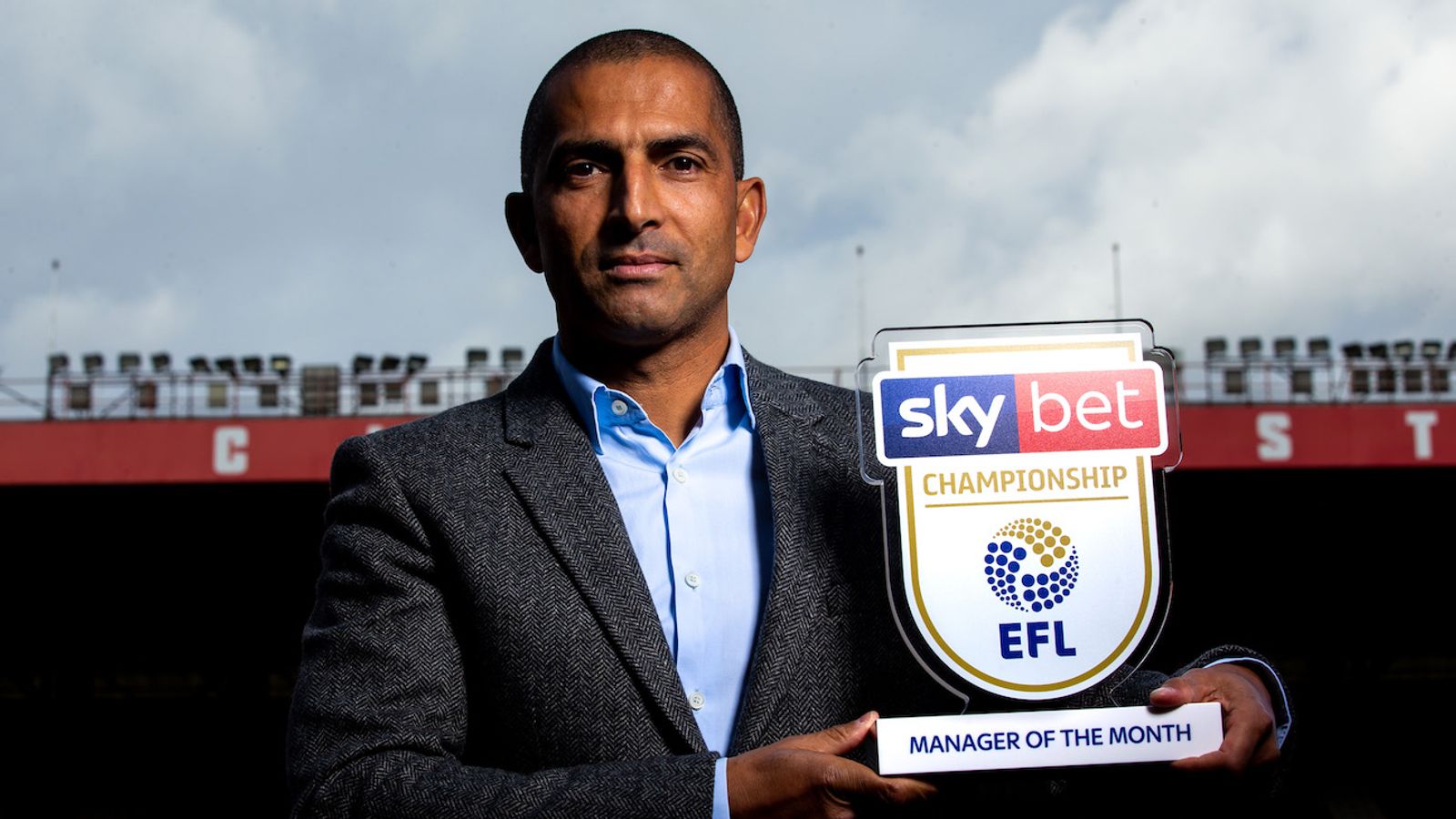 Nottingham Forest boss Sabri Lamouchi and Wigan defender Chey Dunkley ...