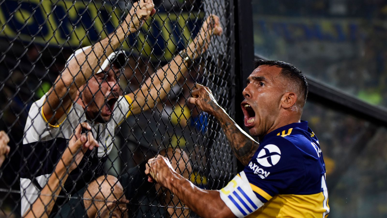 Carlos Tevez: Diego Maradona kiss helps Boca Juniors striker to title ...