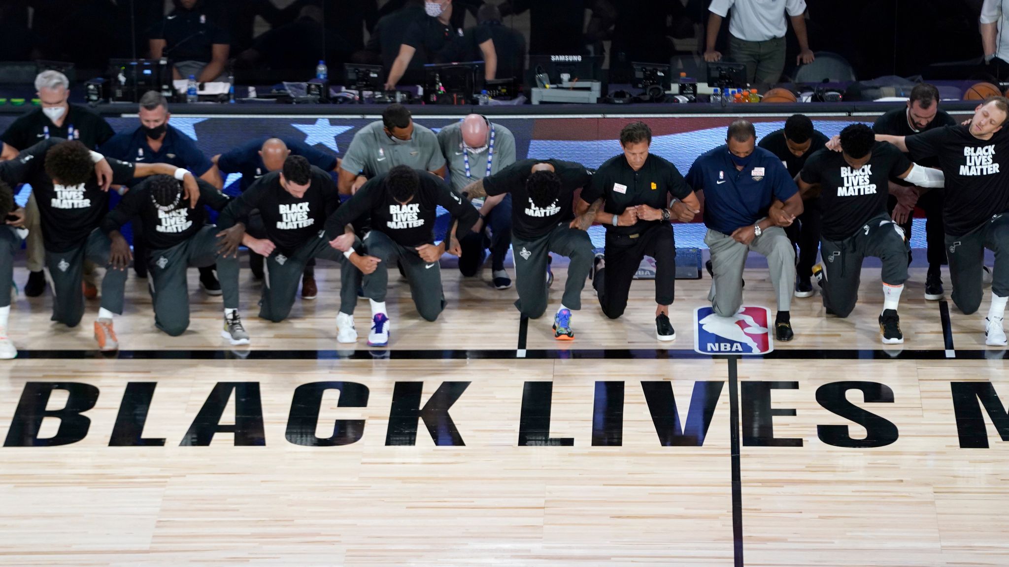 NBA players kneel during anthem in Black Lives Matter protest at ...