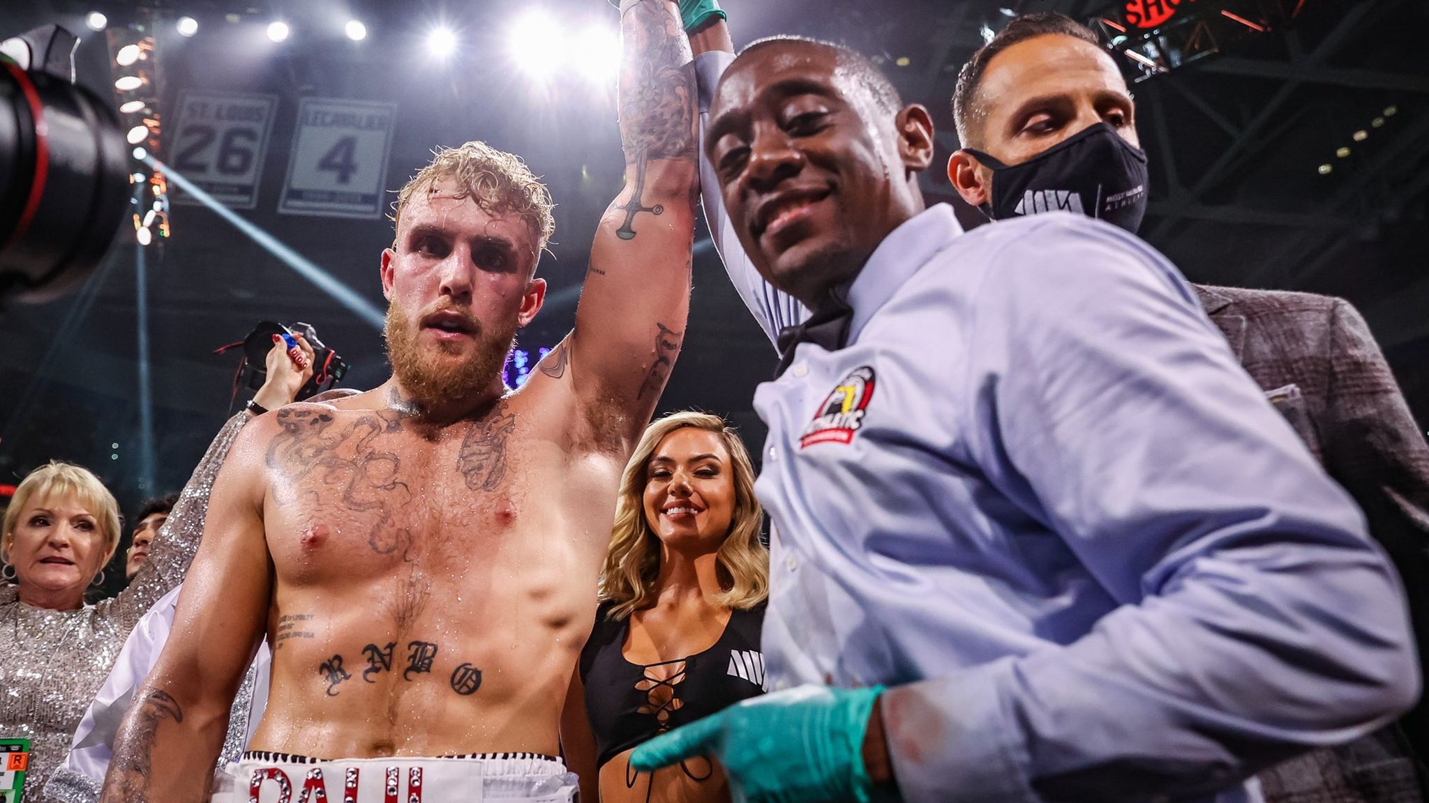 Jake Paul emphatically knocks out Tyron Woodley in sixth round of ...