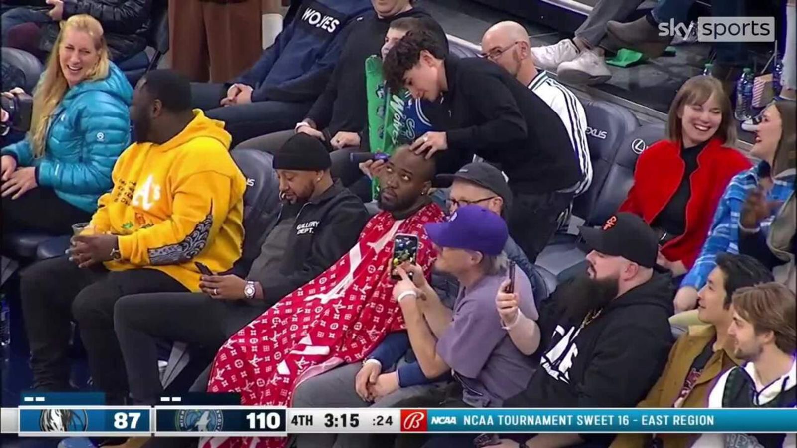 NBA fan gets haircut during game between Dallas Mavericks and Minnesota ...